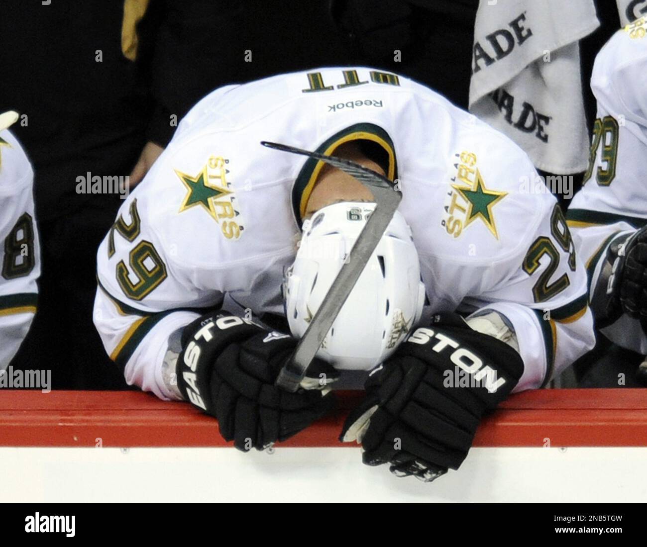 Dallas Stars center Steve Ott rests his head on the bench during a pre ...