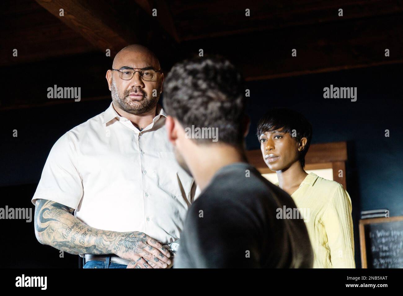 KNOCK AT THE CABIN, from left: Dave Bautista, Ben Aldridge, Nikki Amuka ...