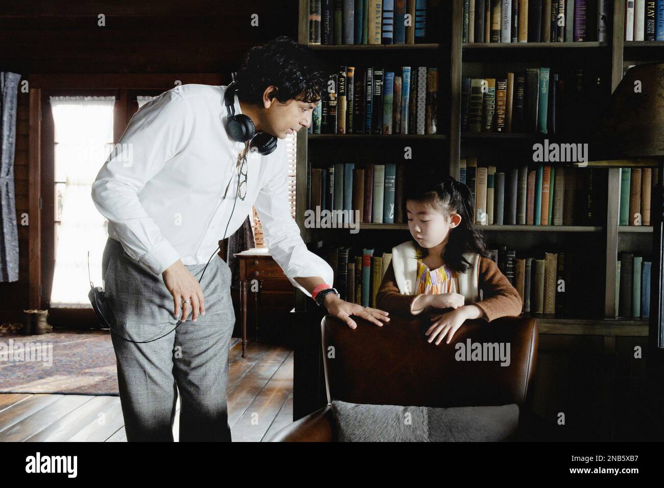 KNOCK AT THE CABIN, from left: director M. Night Shyamalan, Kristen Cui ...