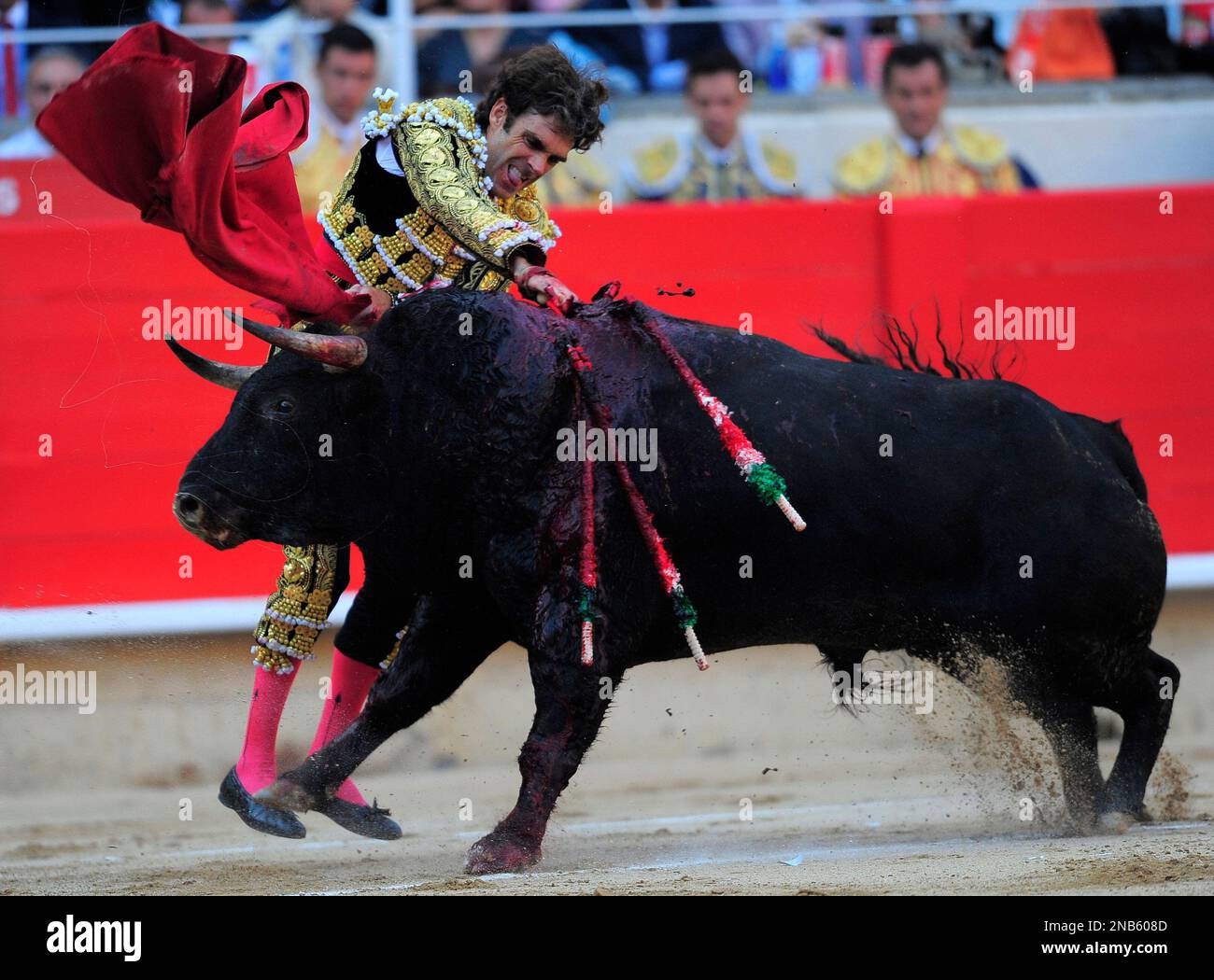 Spain's bullfighter Jose Tomas delivers the final blow to a bull at the ...