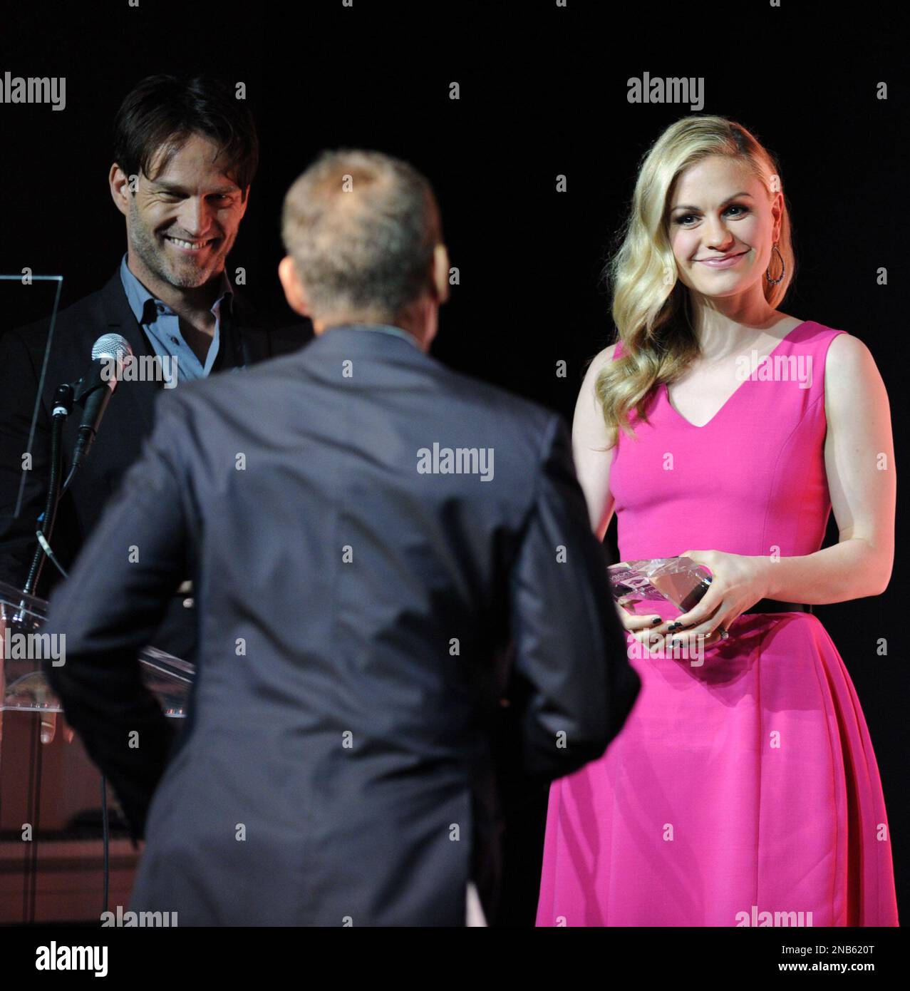 Stephen Moyer, left, and Anna Paquin, right, present the inspiration ...