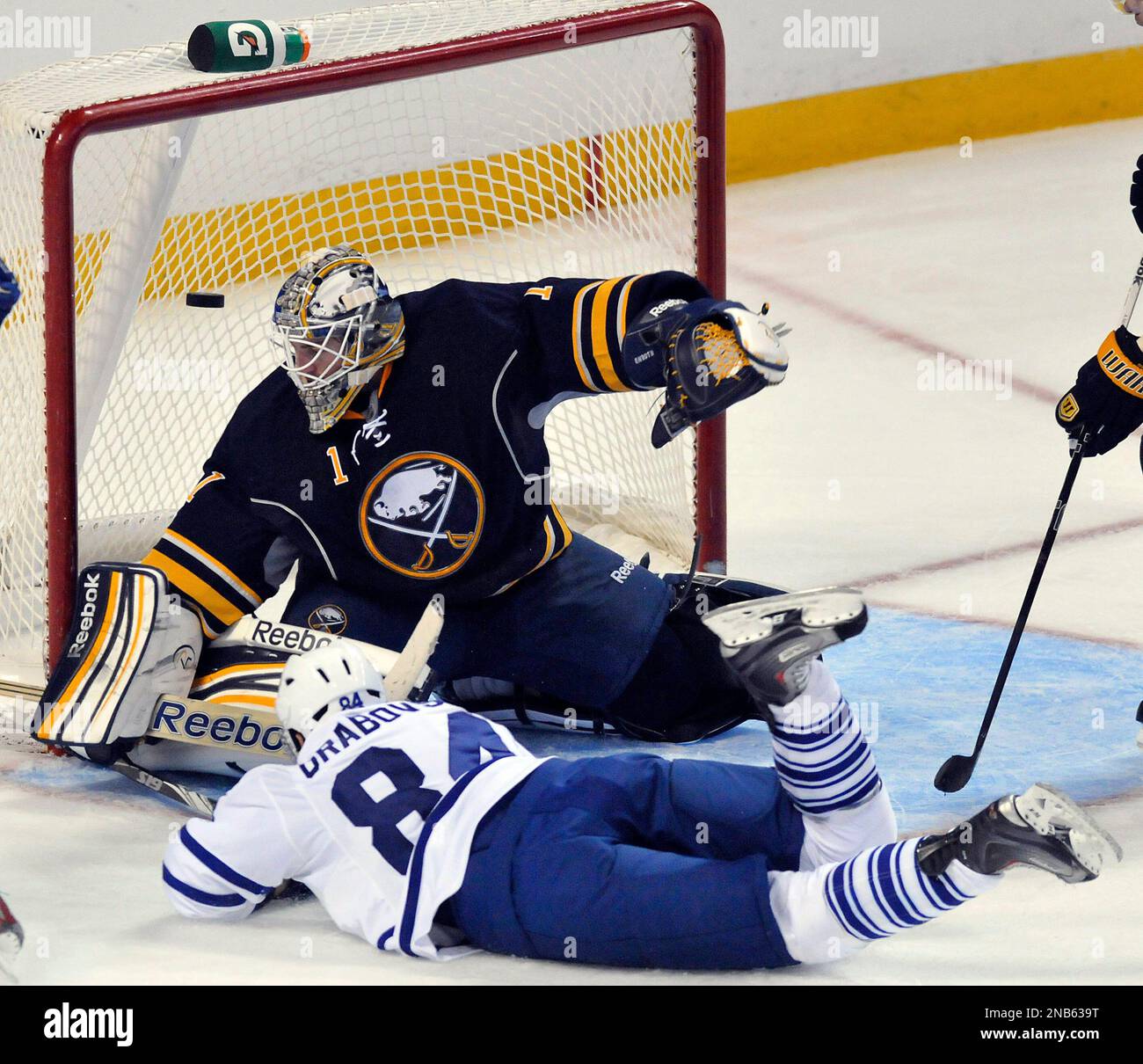 Toronto Maple Leafs forward Mikhail Grabovski scores a sliding goal ...