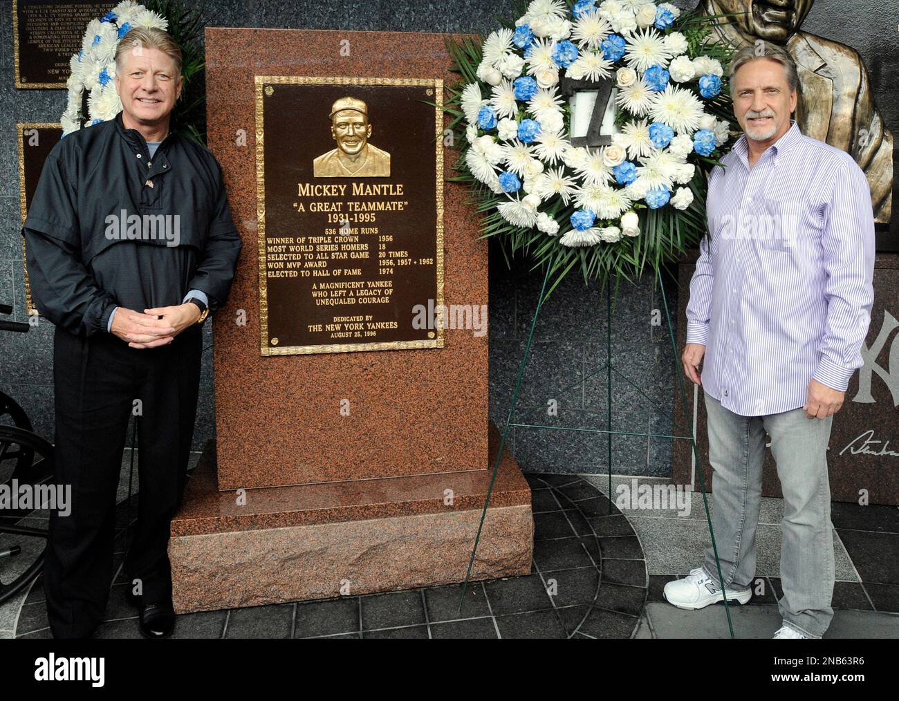 Mickey Mantle's sons David, left, and Danny pose by Mantle's plaque in ...
