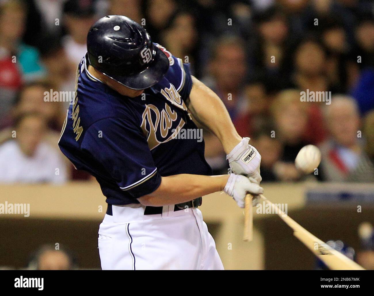 San Diego Padres' Aaron Cunningham has his bat handle shattered by an ...
