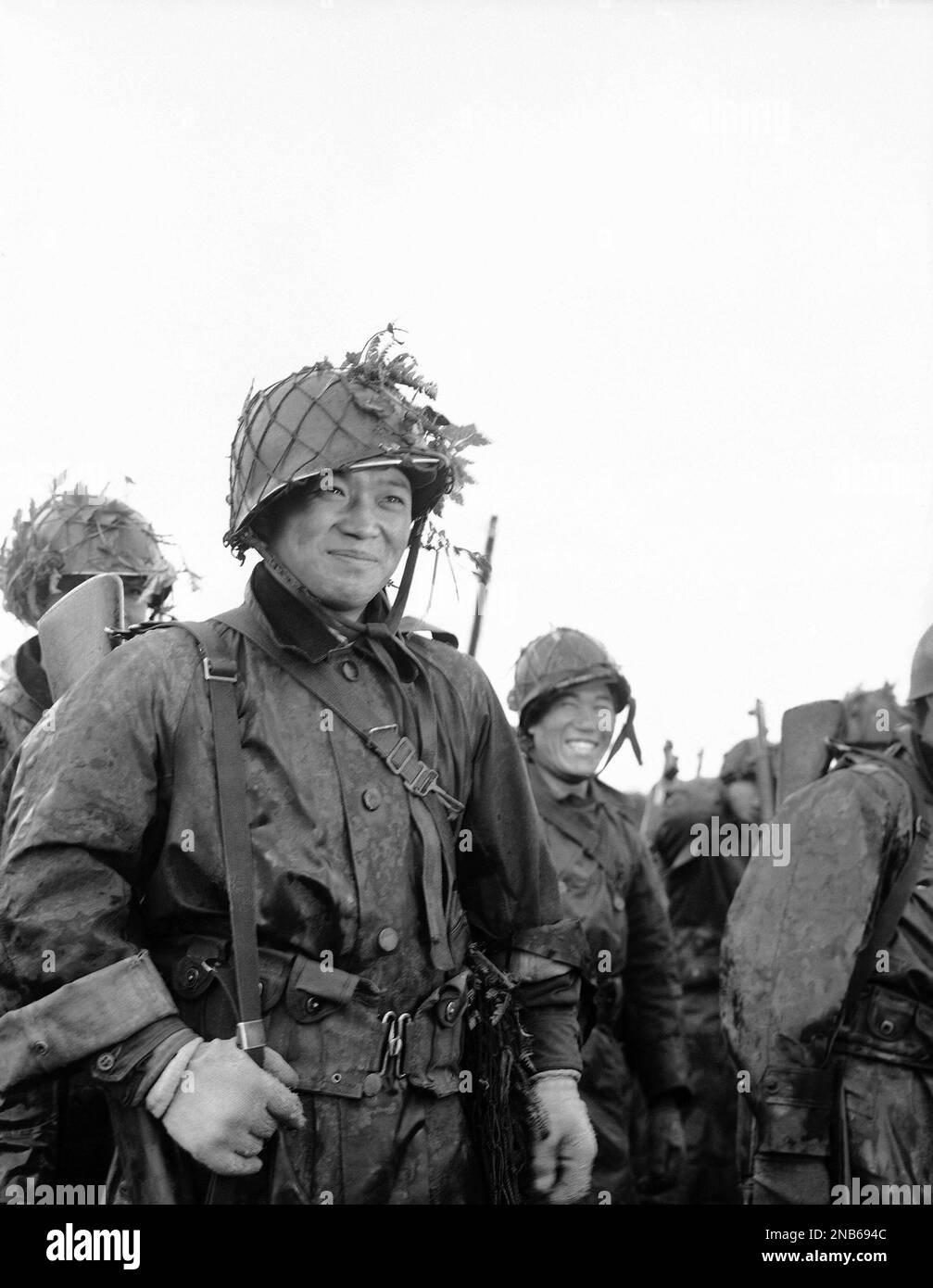 A typical Japanese soldier grins with his full infantry pack in western ...
