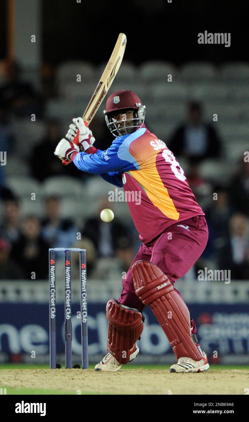 West Indies' Darren Sammy hits a ball from England's Ravi Bopara during ...