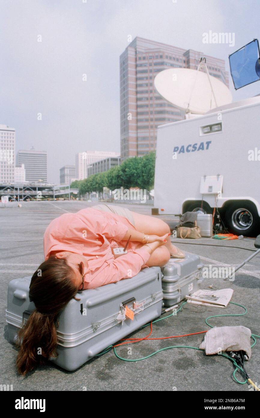 NBC producer Kim Miller takes a nap on the seventh day of deliberations ...