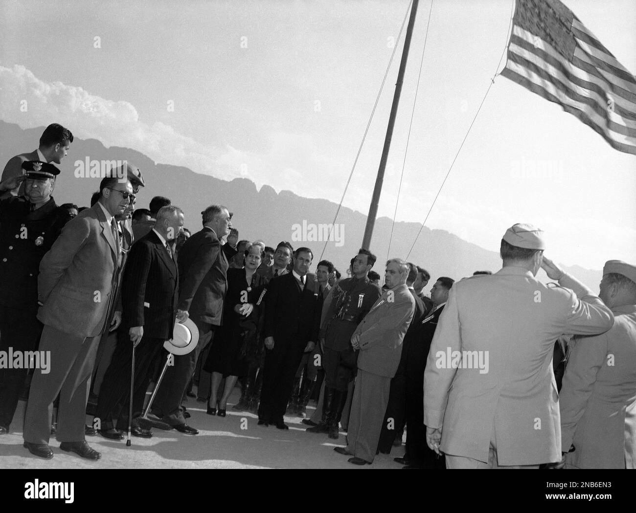 The U.S. flag is hoisted on one of two flagpoles by the railway siding ...
