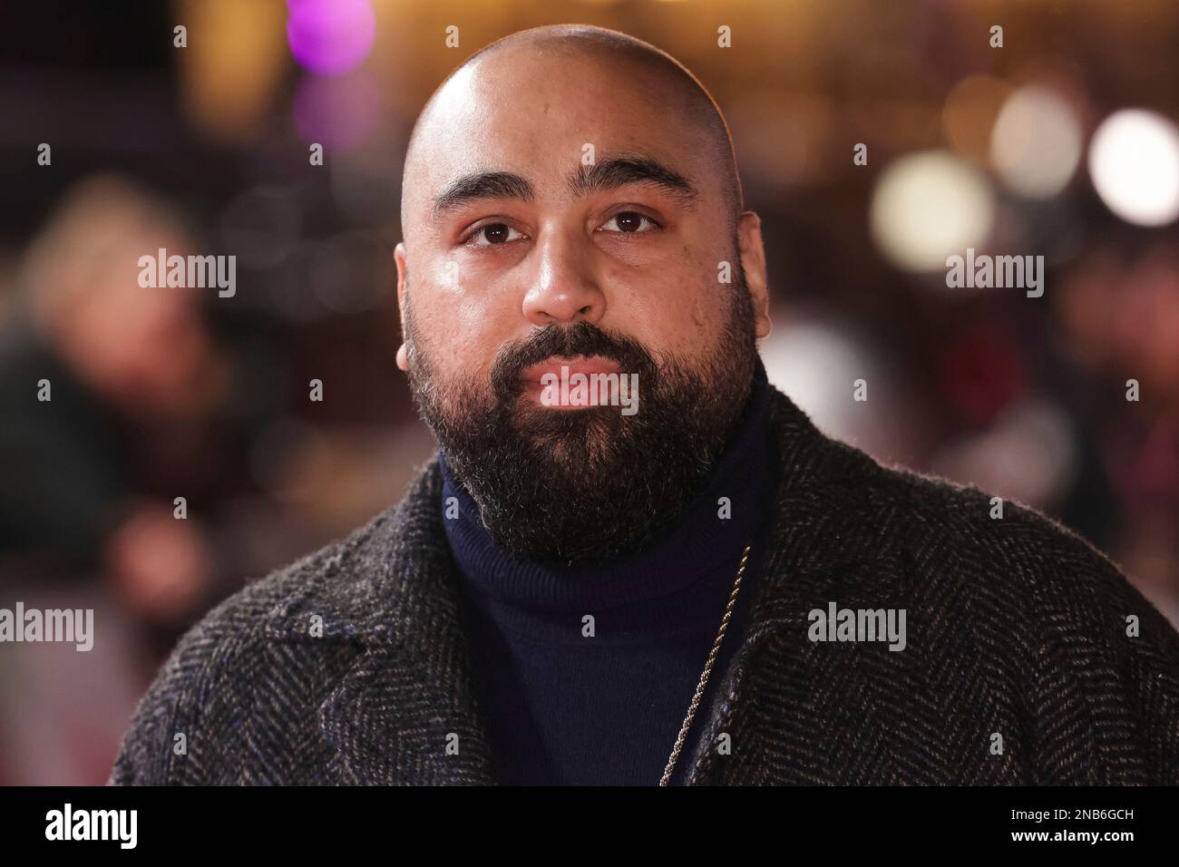 Asim Chaudhry poses for photographers upon arrival for the premiere of ...