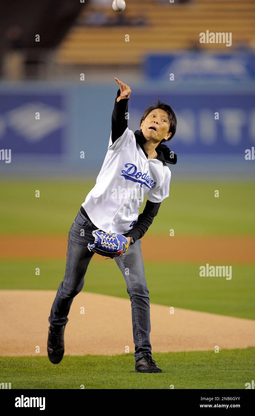 Taiwan's first lady, Chow Mei-ching, throws out the ceremonial first ...
