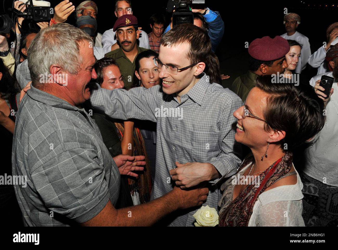 Freed American Shane Bauer, center, meets his father Al Bauer as his ...