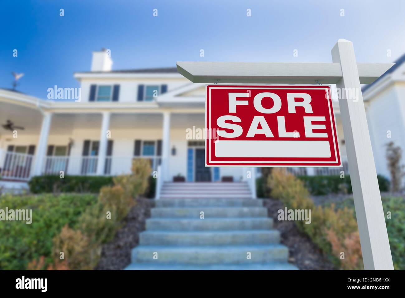 For Sale Real Estate Sign in Front of New House Stock Photo - Alamy