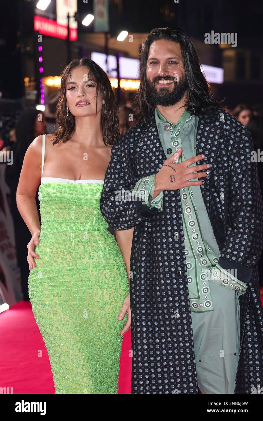 Shazad Latif, right, and Lily James pose for photographers upon arrival ...