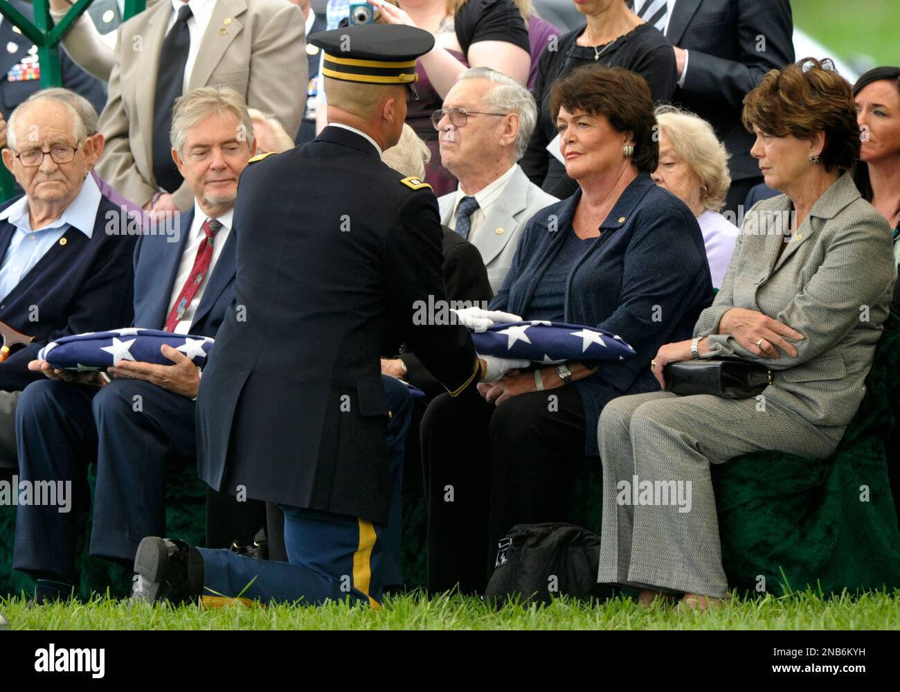Barbara McEvoy, niece of First Lt. William J. Sarsfield, receives a ...