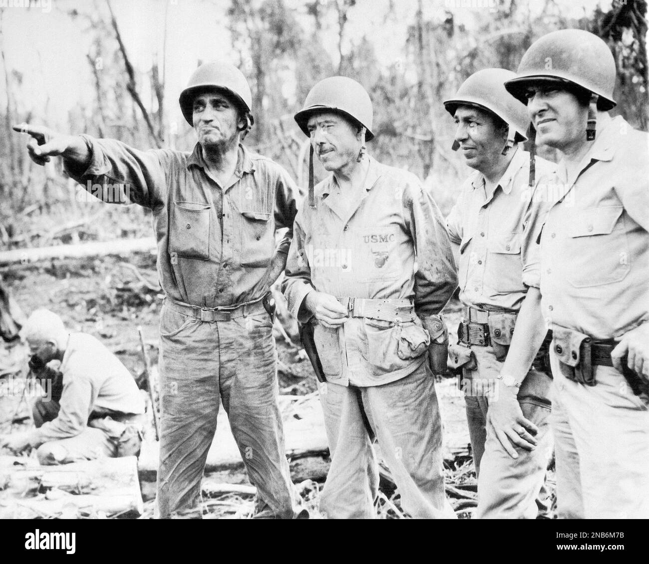 Examining a bit of New Britain battleground on Feb. 1, 1944, Marine ...