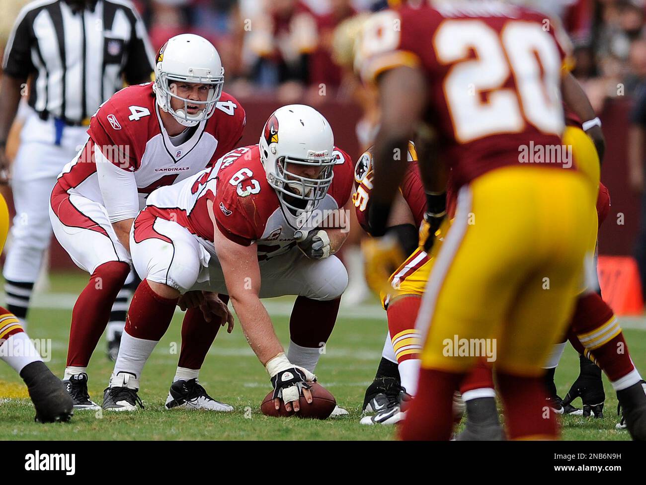 Arizona Cardinals quarterback Kevin Kolb (4) lines up for a play behind ...
