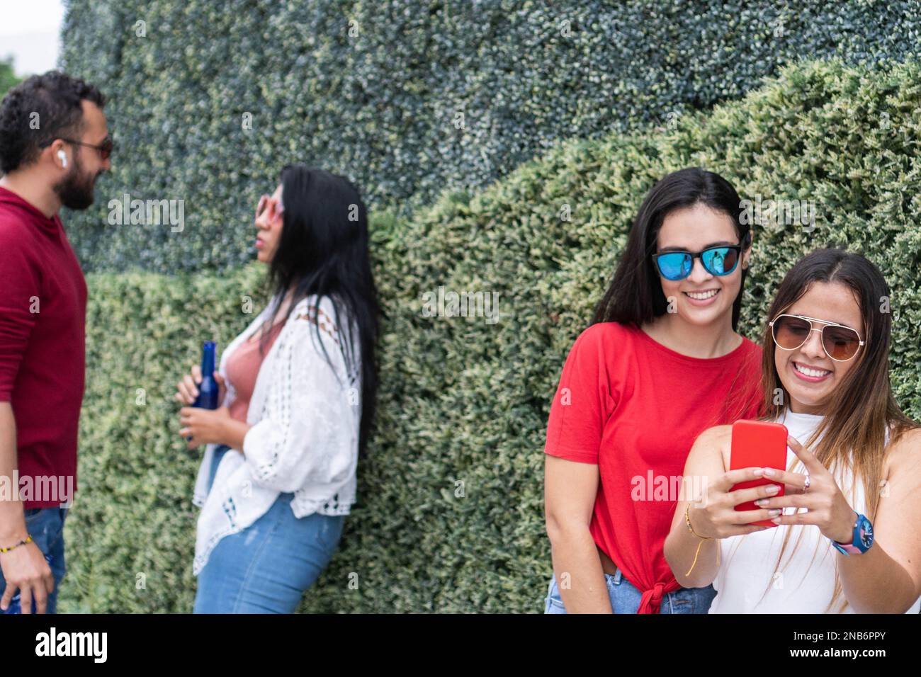 Two friends having fun with mobile. Friends Concept Stock Photo - Alamy