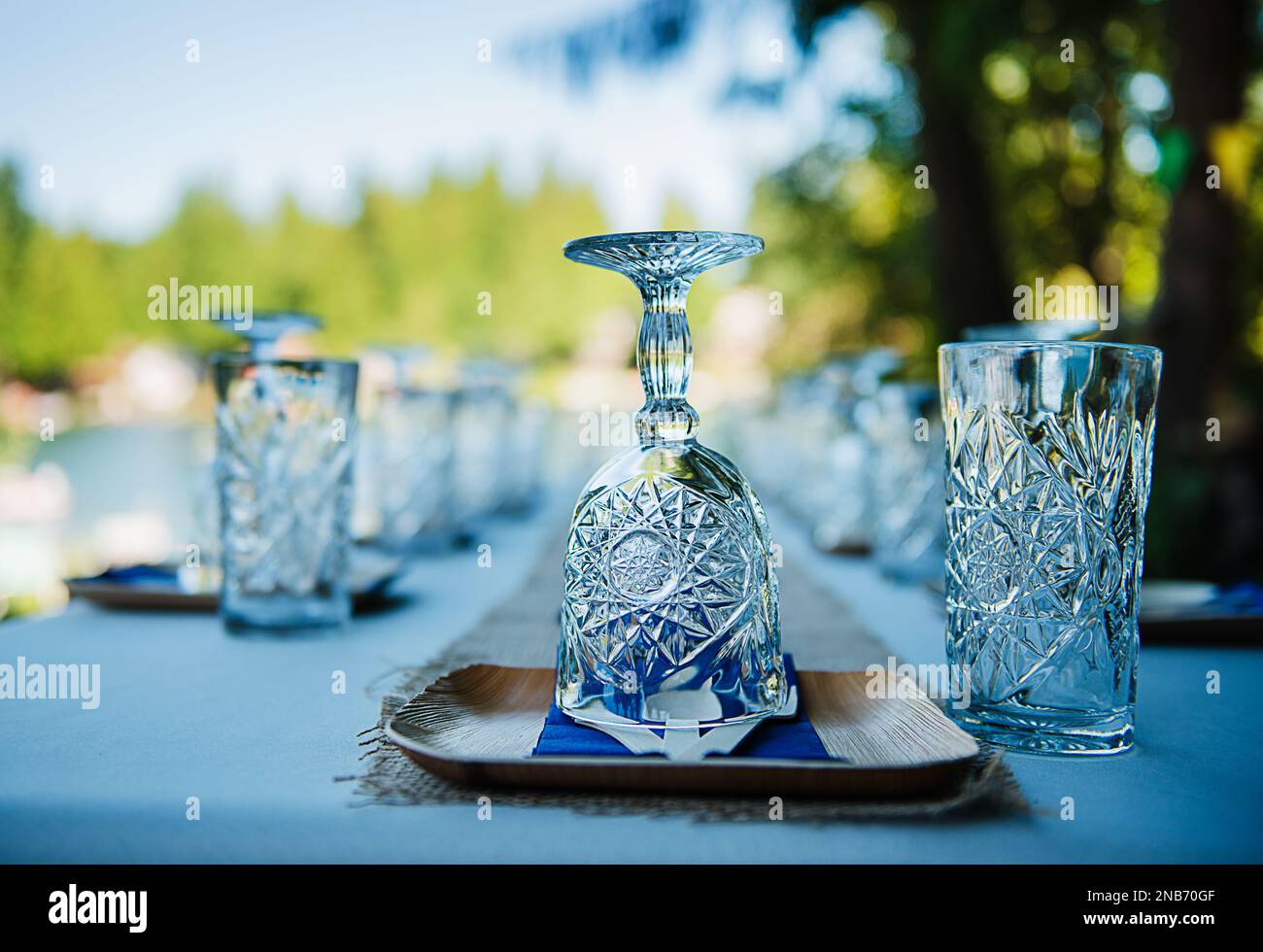 Glasses on a table for a catered event Stock Photo - Alamy