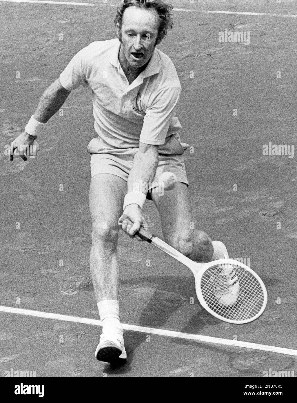 Australia’s Rod Laver strokes a forehand return to Anand Amritraj of ...