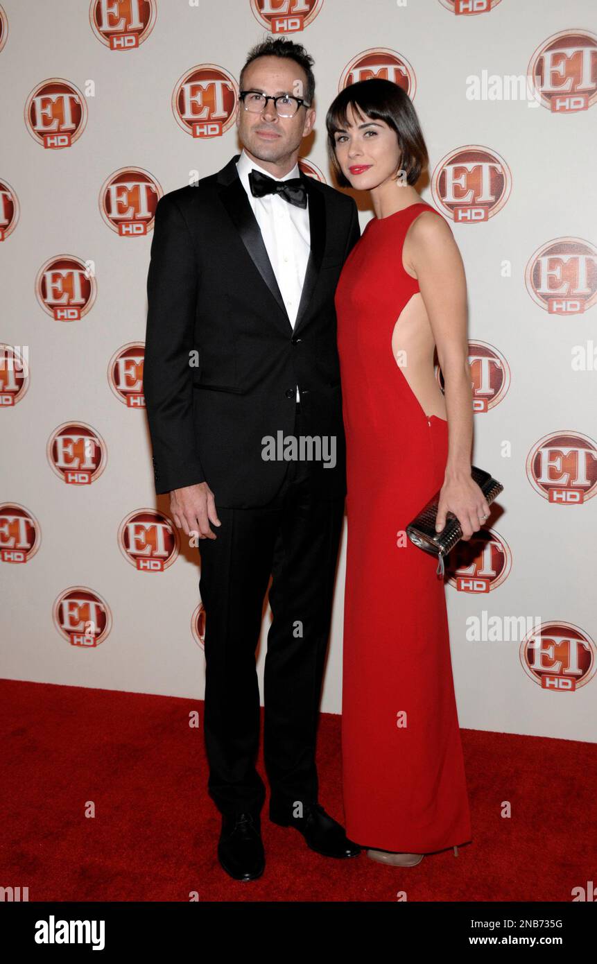 Actor Jason Lee, left, and his wife, actress Ceren Alkac, arrive at the ...