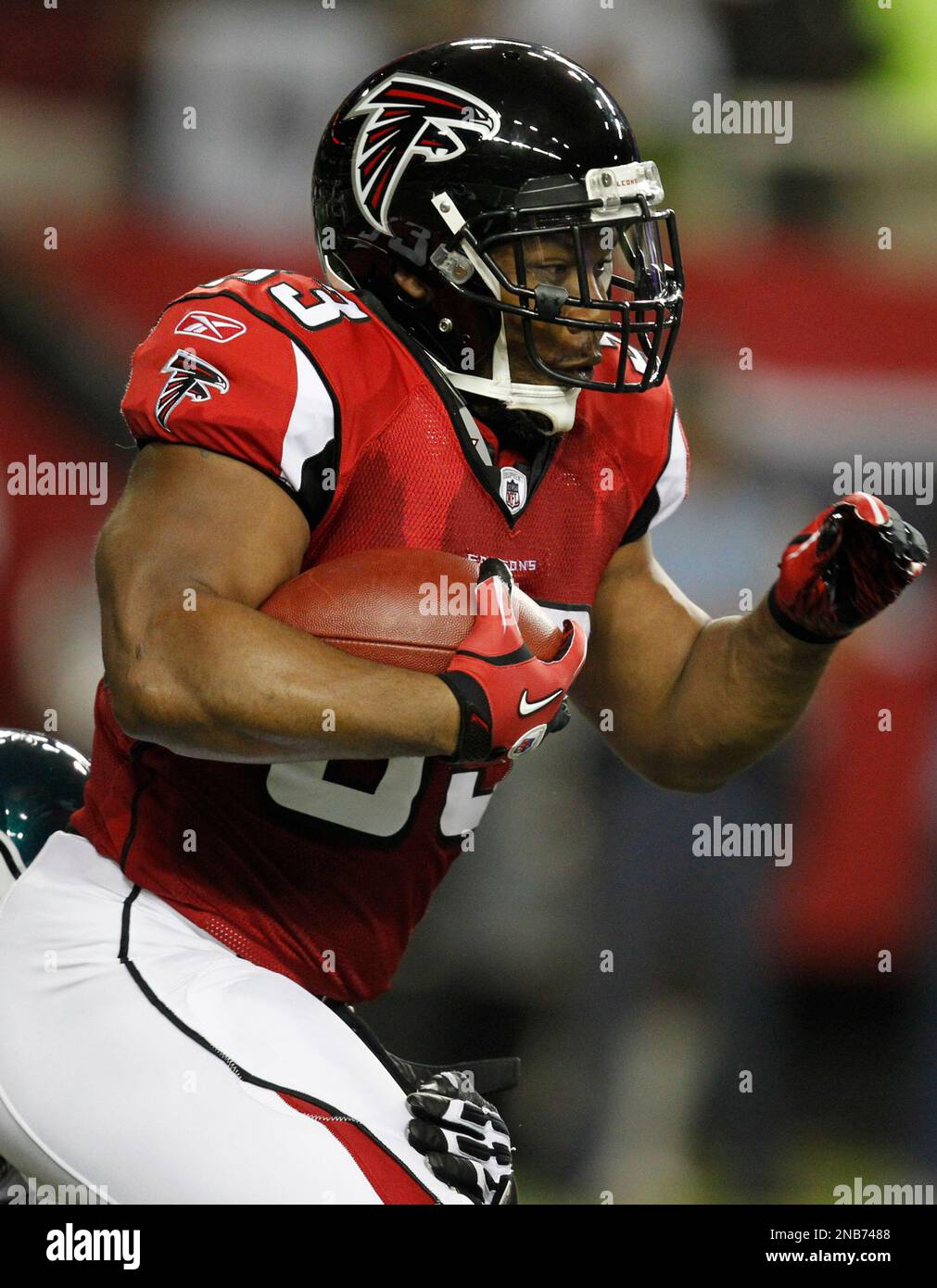 Atlanta Falcons running back Michael Turner (33) looks for running room ...