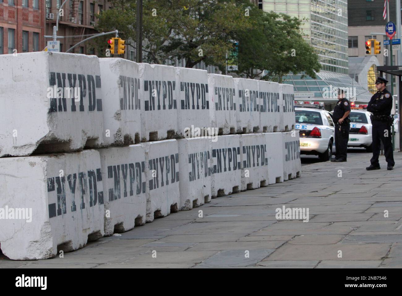 New York City Police stand guard next to concrete barricades set up in ...