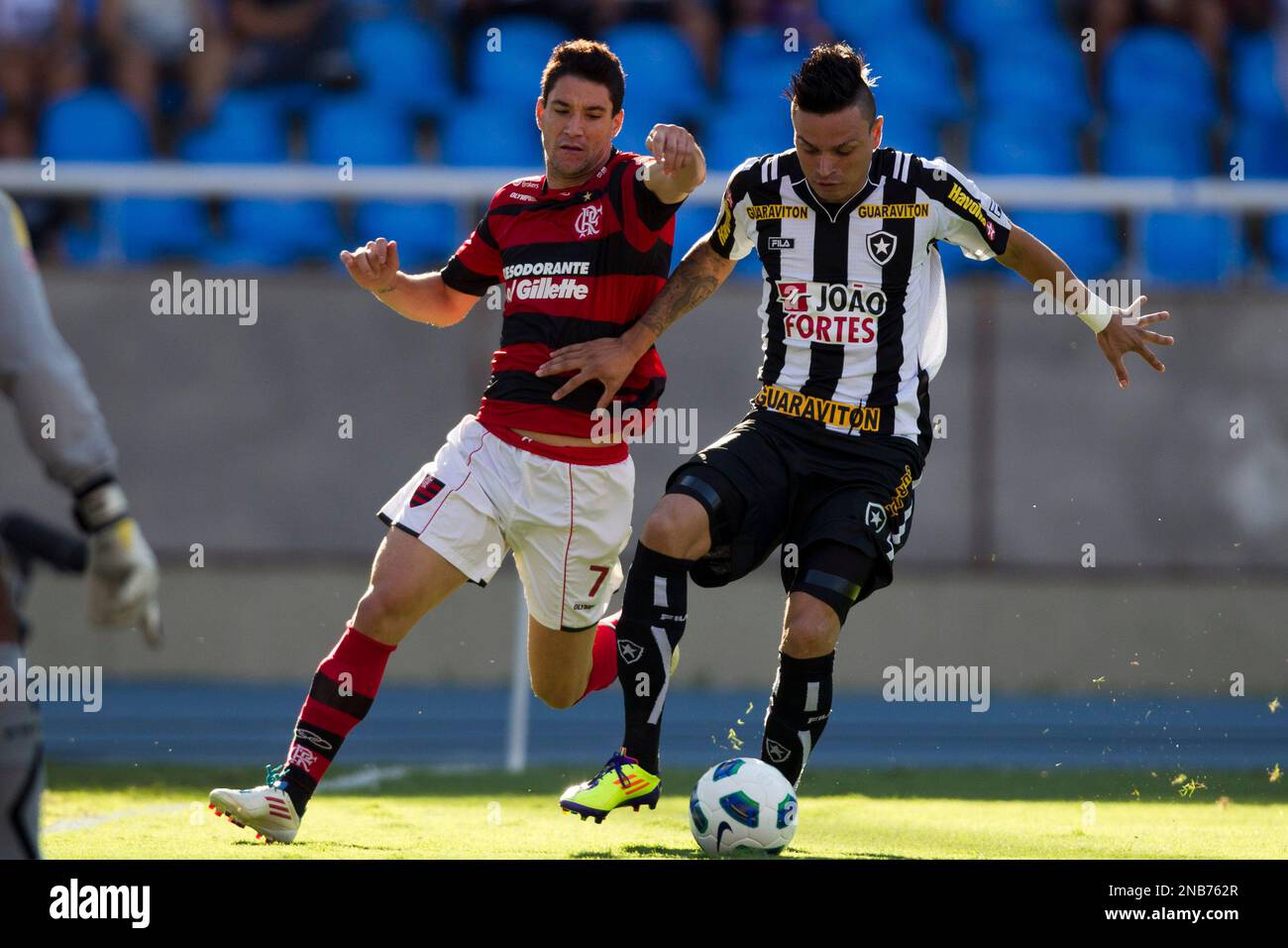 Flamengo's Thiago Neves, left, challenges Botafogo's Fabio Ferreira ...