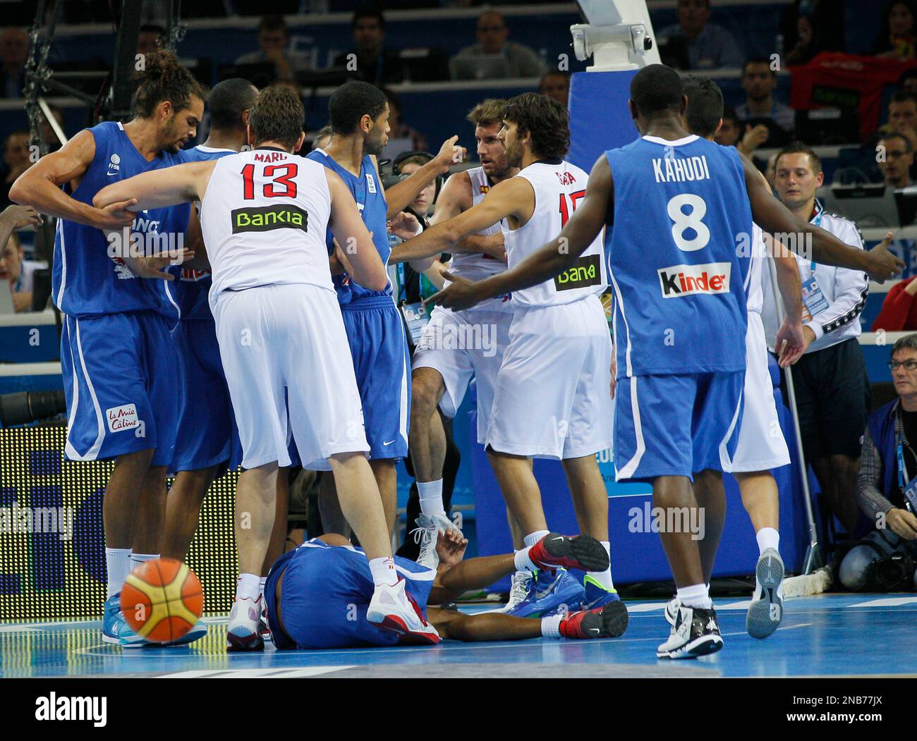 Spain's and France players react during their EuroBasket European ...