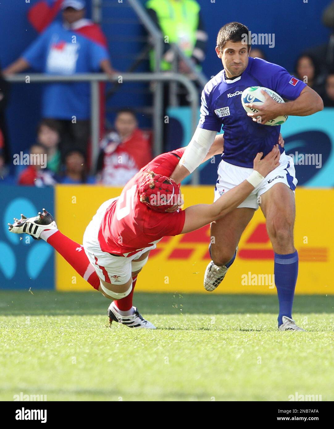 Samoa's Paul Williams, right, pushes off Wales' Alun Wyn Jones during ...