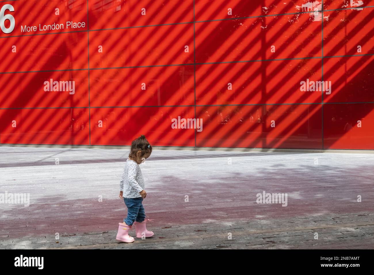 England, London, Southwark, Small Child Walking in front of 6 More ...