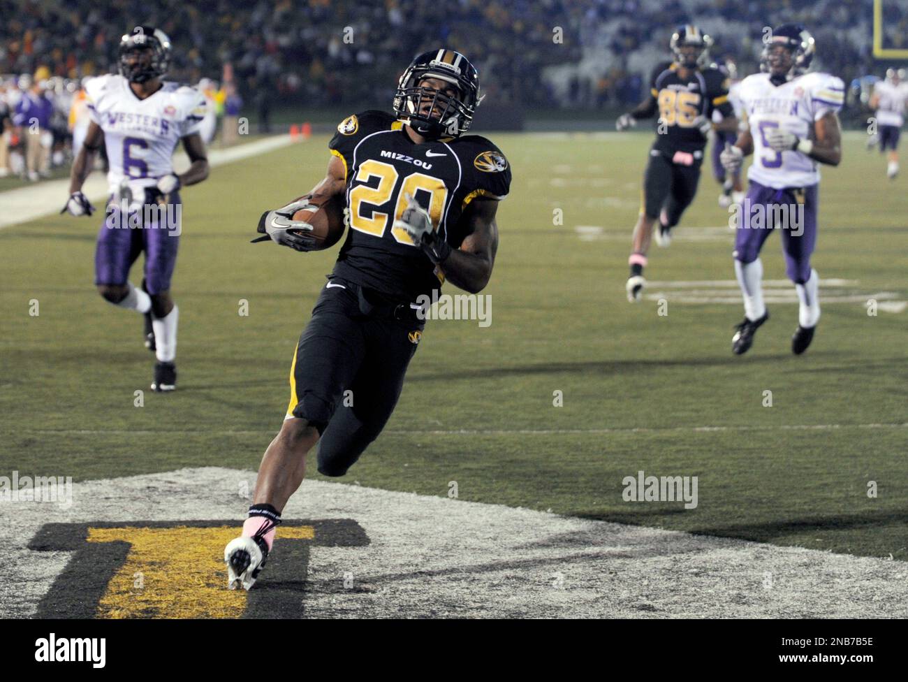 Missouri running back Henry Josey, front, runs into the end zone for a ...