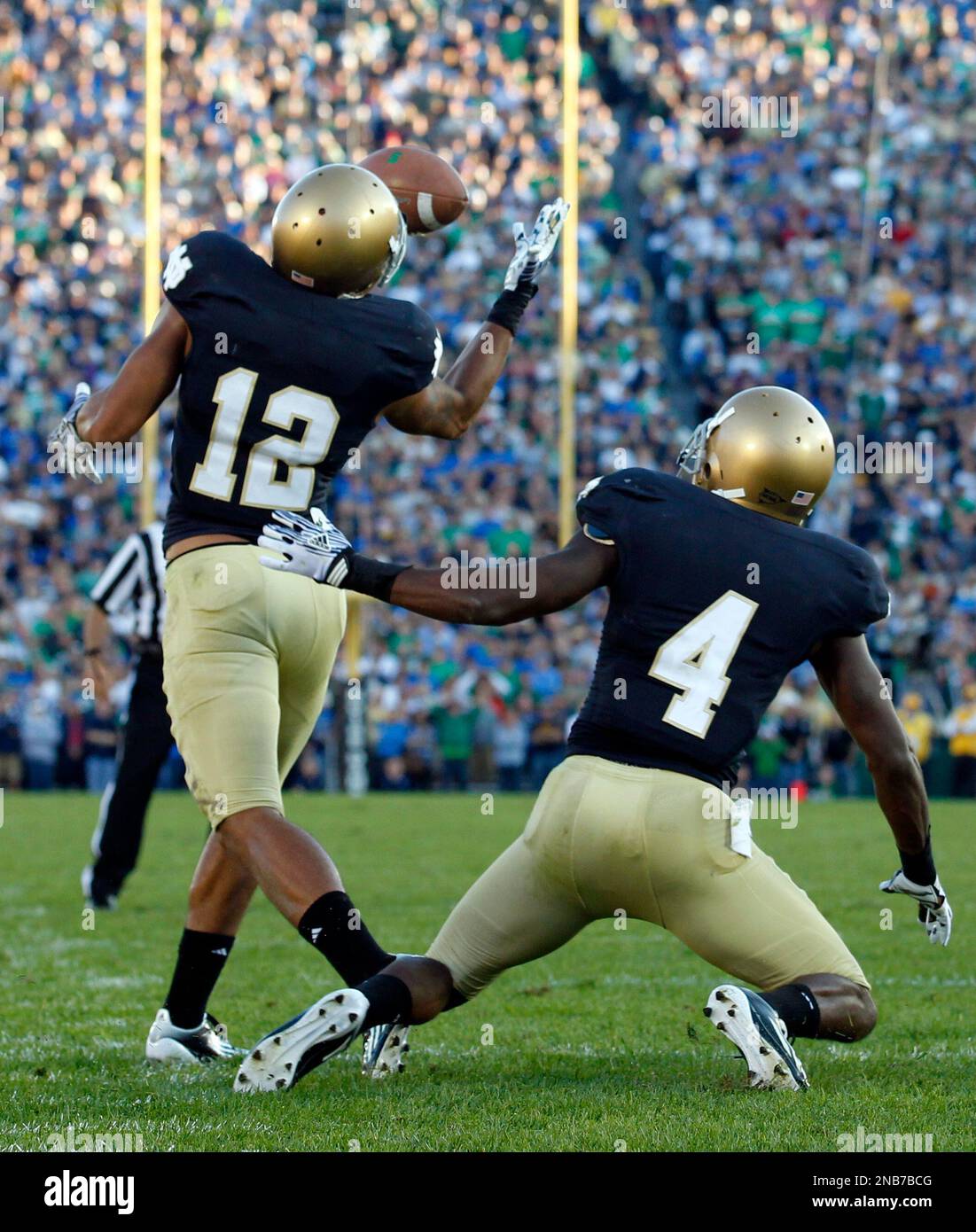 Notre Dame cornerback Robert Blanton (12) intercepts a pass from ...