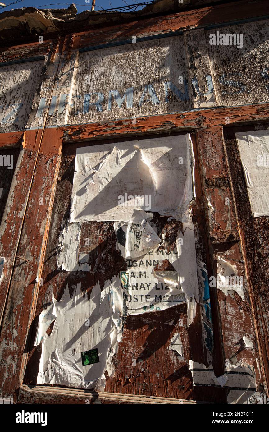 Side lit architectural textures of exterior peeling building exterior ...