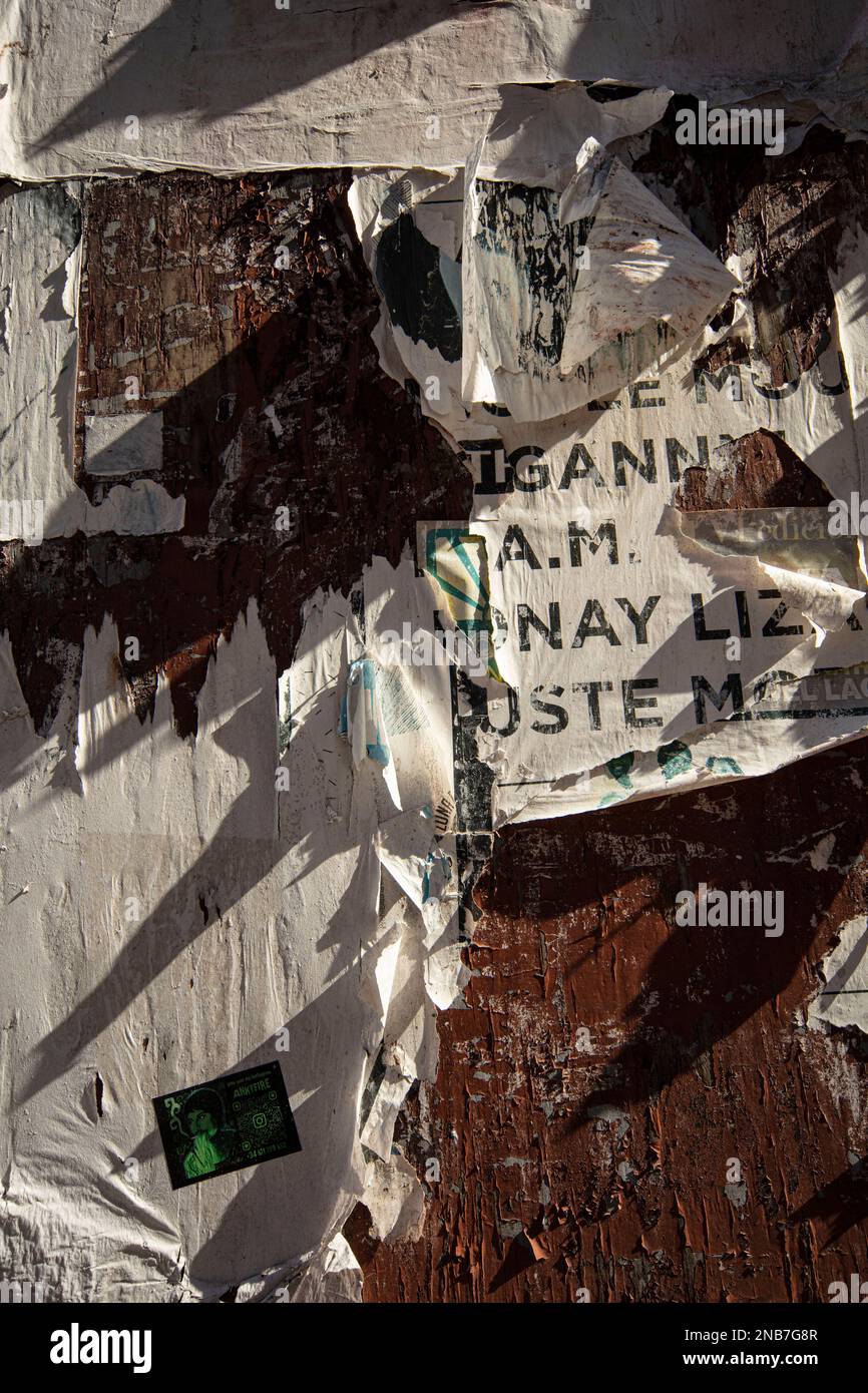 Side lit architectural textures of exterior peeling building exterior ...