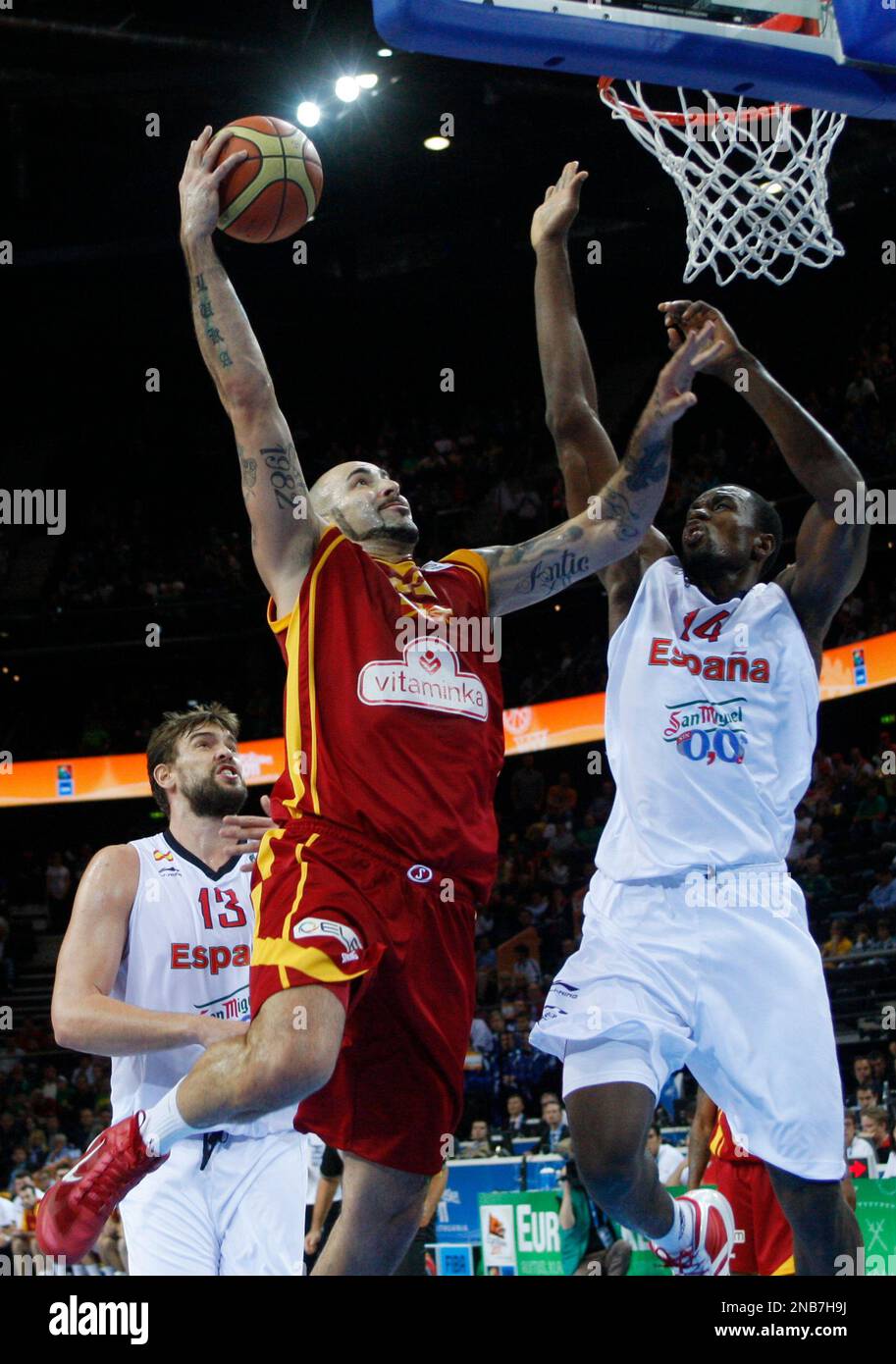 Serge Ibaka, right, from Spain tries to block Pero Antic, left, from ...