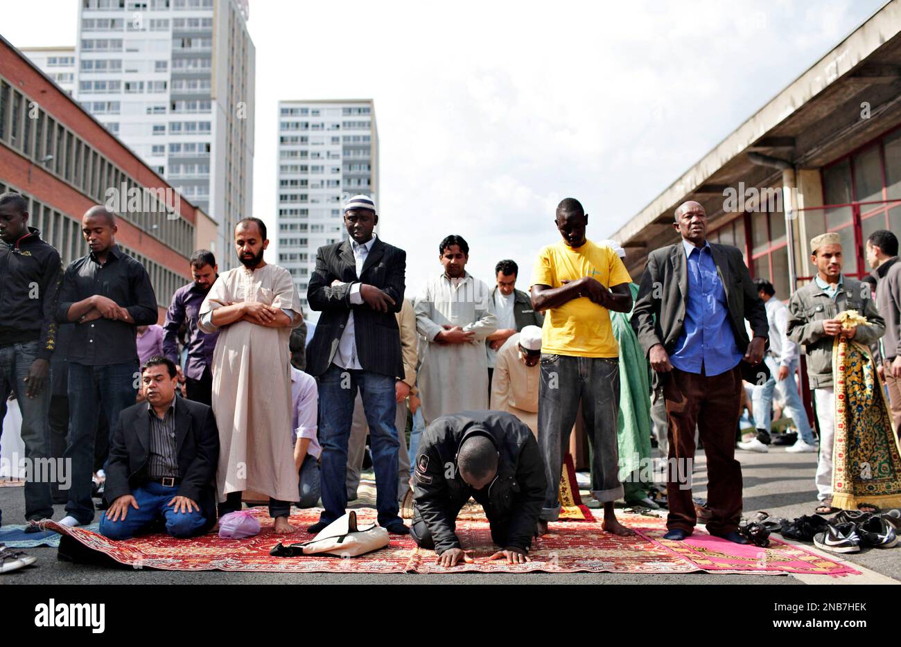 French Muslims attend Friday prayers at a disused former fire station ...