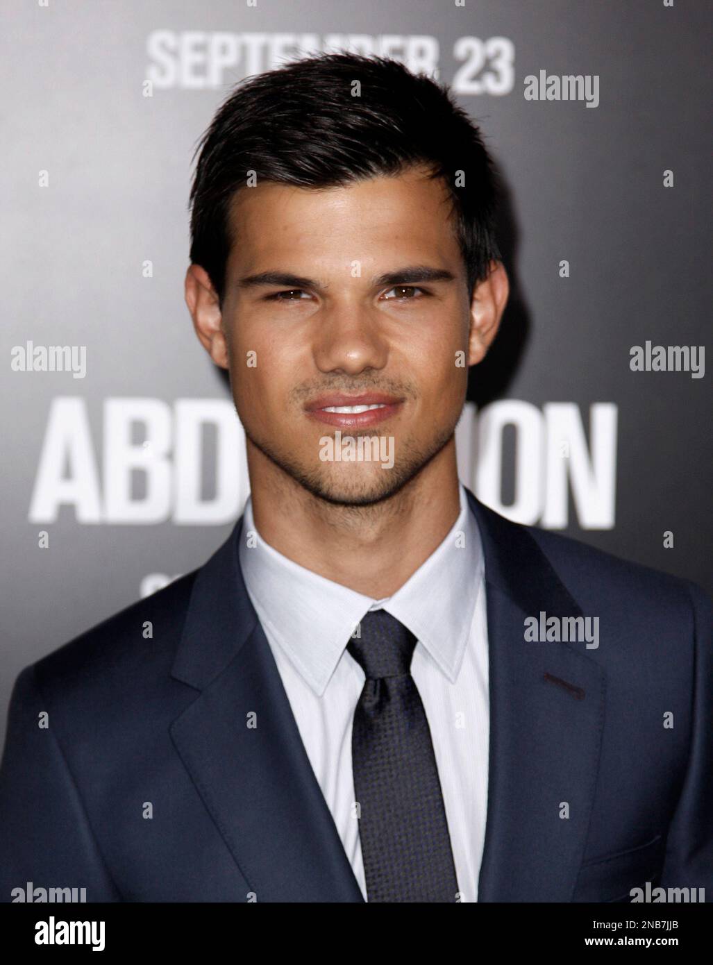 Cast member Taylor Lautner arrives at the premiere of "Abduction" in ...