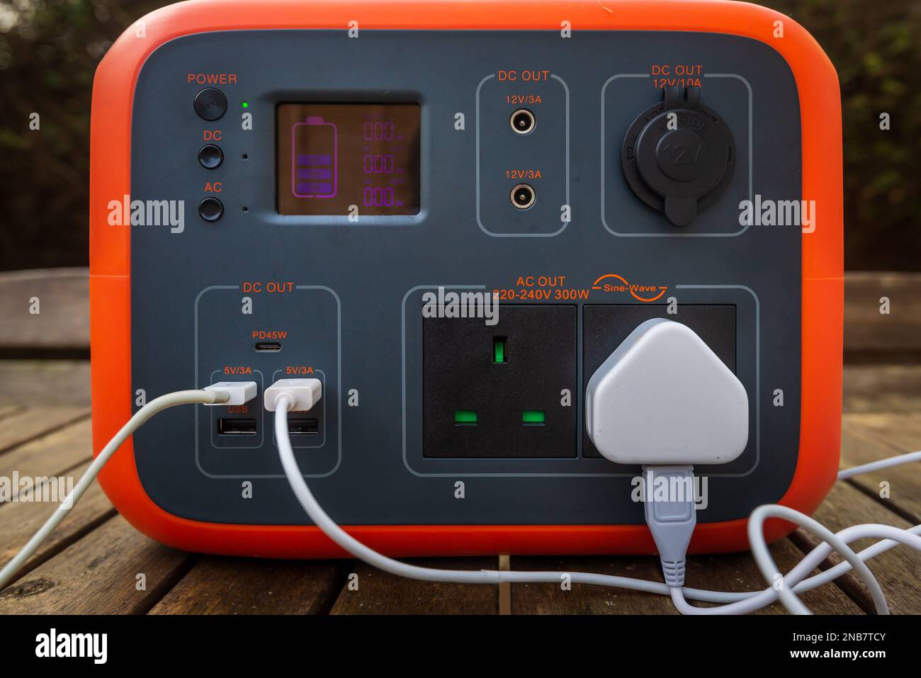 Close up of portable power station solar electricity generator on table ...