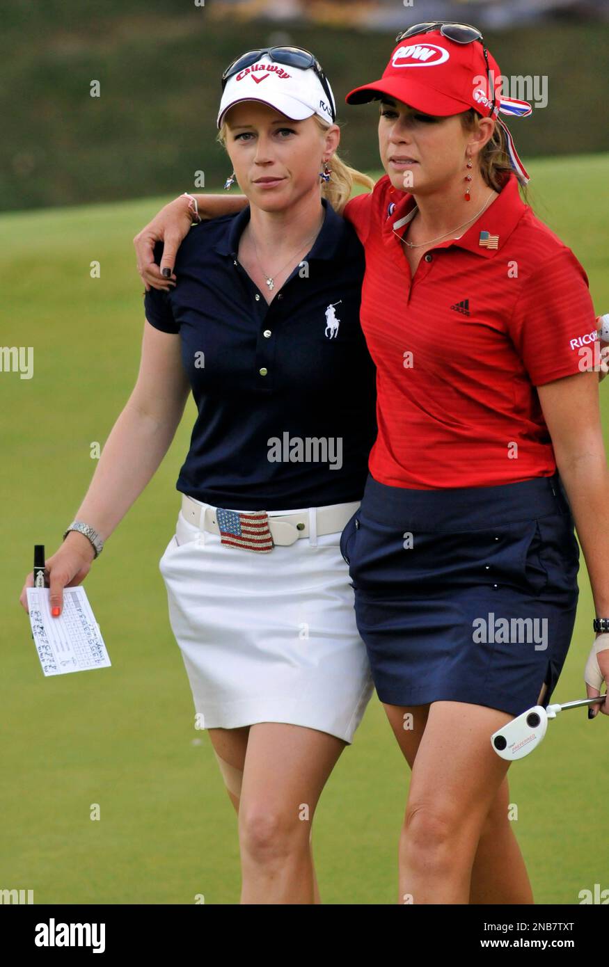Morgan Pressel, left, and Paula Creamer, right, walk off the eighteenth ...