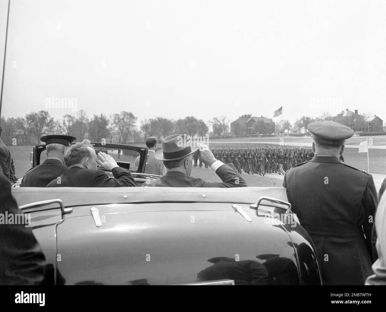 President salutes as troops begin to parade past in review at Jefferson ...