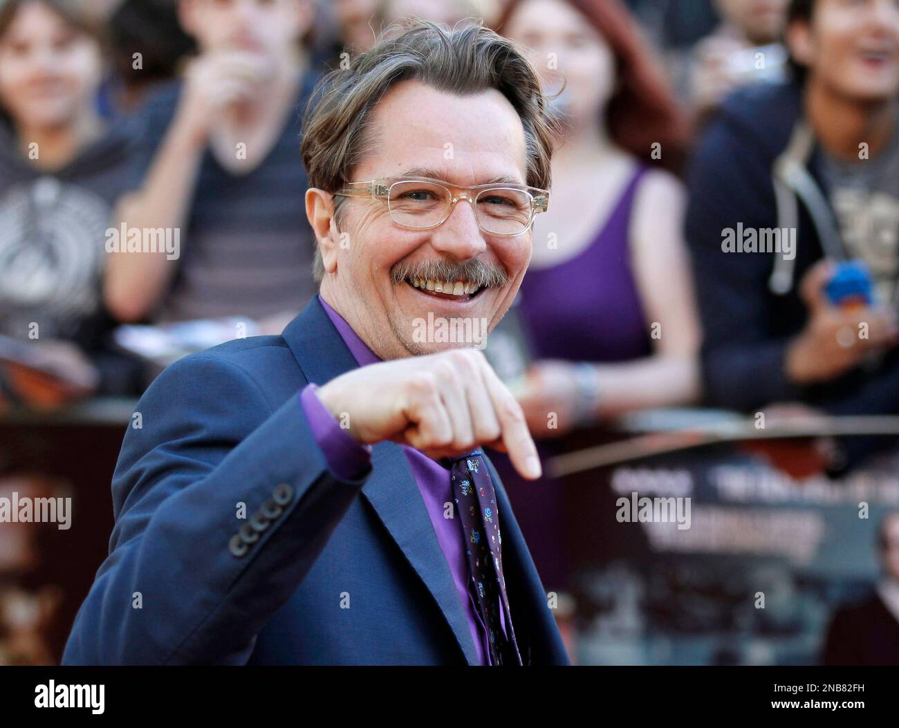 British actor Gary Oldman reacts as he arrives for the UK film premiere ...