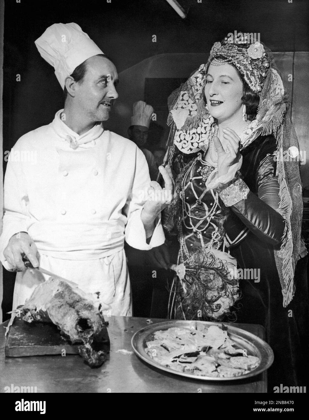 Chef Toni Goodwin is interrupted in his task of carving the roast royal ...
