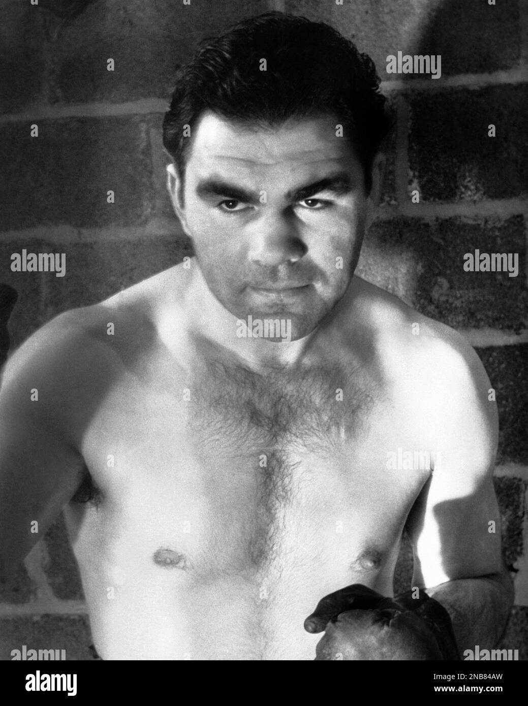 German Heavyweight boxer Max Schmeling with a face like a grim mask, on ...
