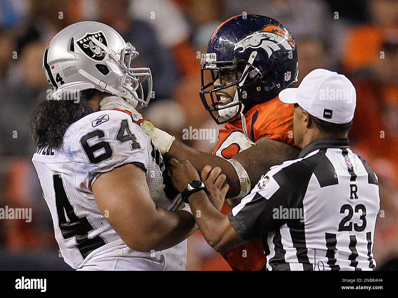 Denver Broncos defensive tackle Kevin Vickerson (99) confronts Oakland ...