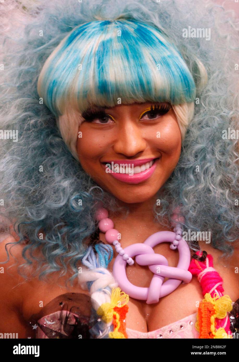 Singer Nicki Minaj poses backstage the Betsey Johnson Spring 2012 ...