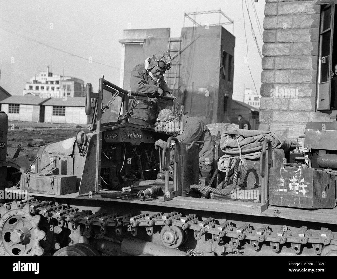 New use for a familiar vehicle, these Japanese army personnel carriers ...