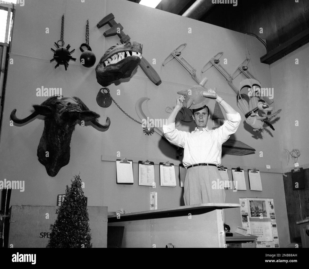 Some of the props created for television shows are shown by Robert ...