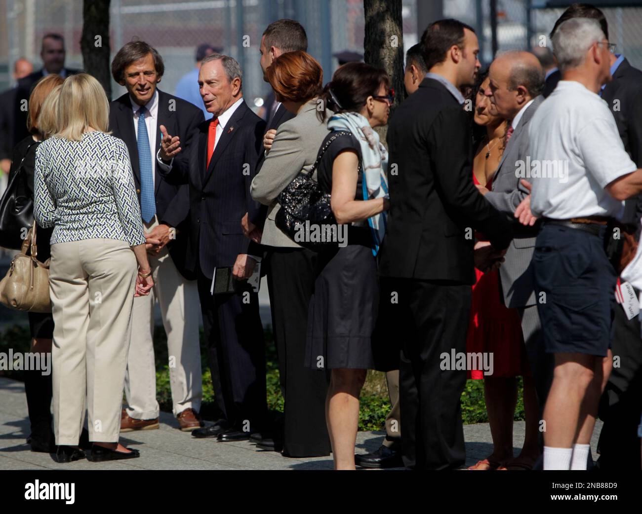 New York City Mayor Michael Bloomberg, third from left, greets the ...