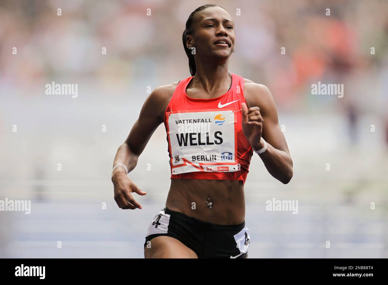 U.S. Kellie Wells runs the women's 100 meters hurdles during the ISTAF ...