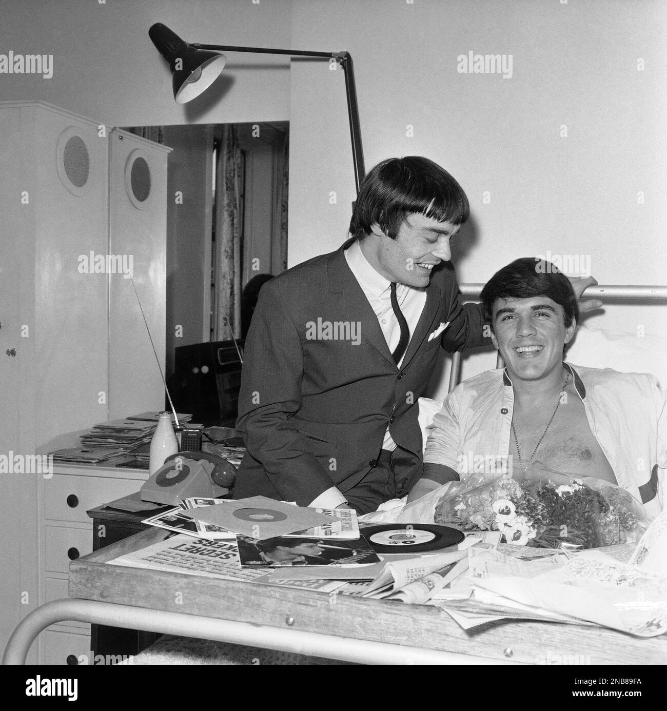 Jimmy Nicol visiting fellow drummer Dave Clark, who is resting in a ...